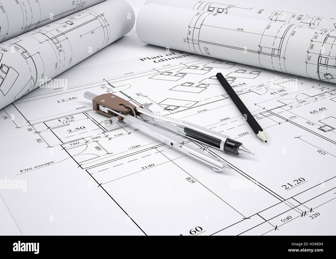 Scrolls architectural drawings and tools Stock Photo - Alamy