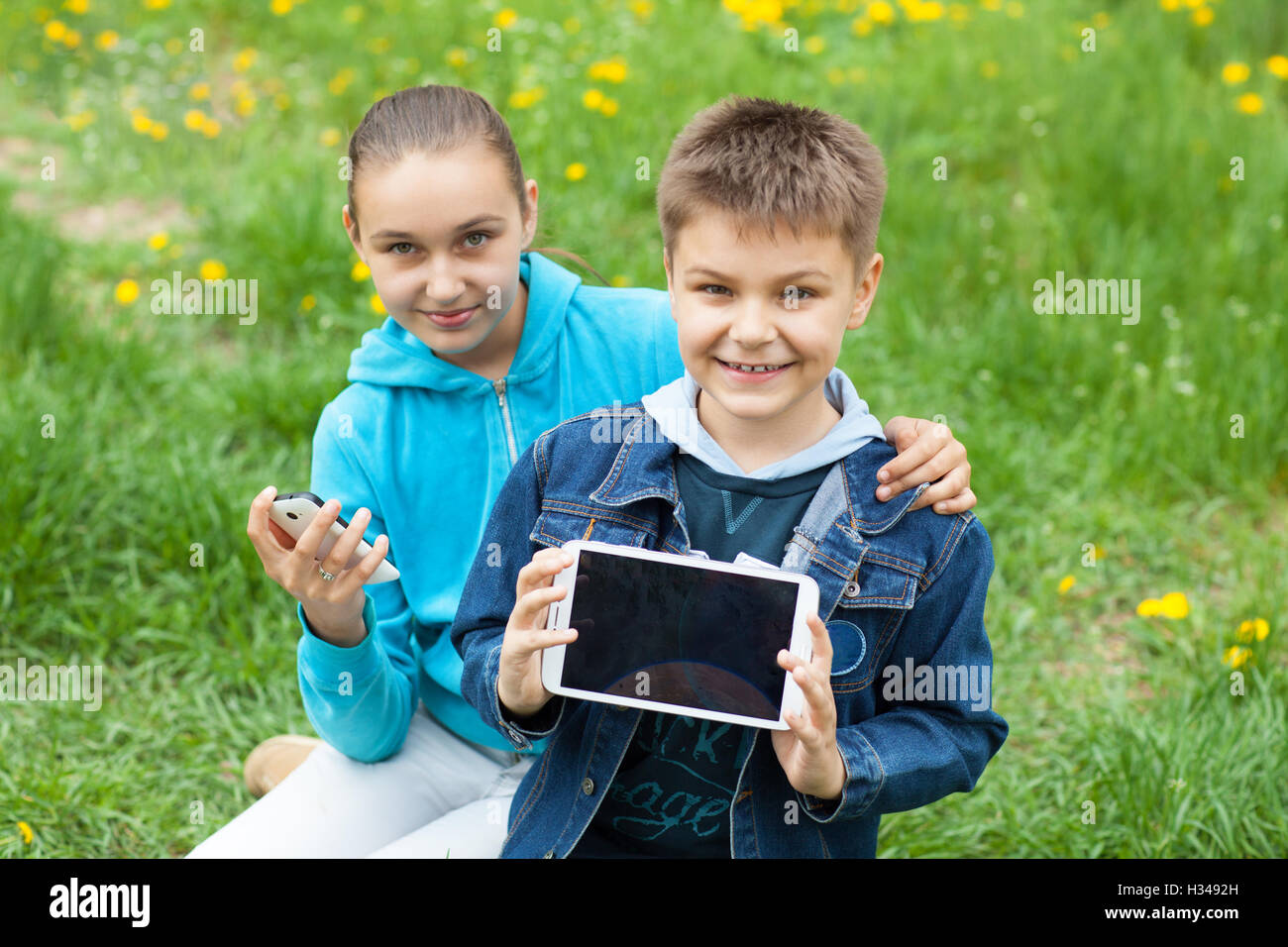 Brother sister laptop computer models hi-res stock photography and ...