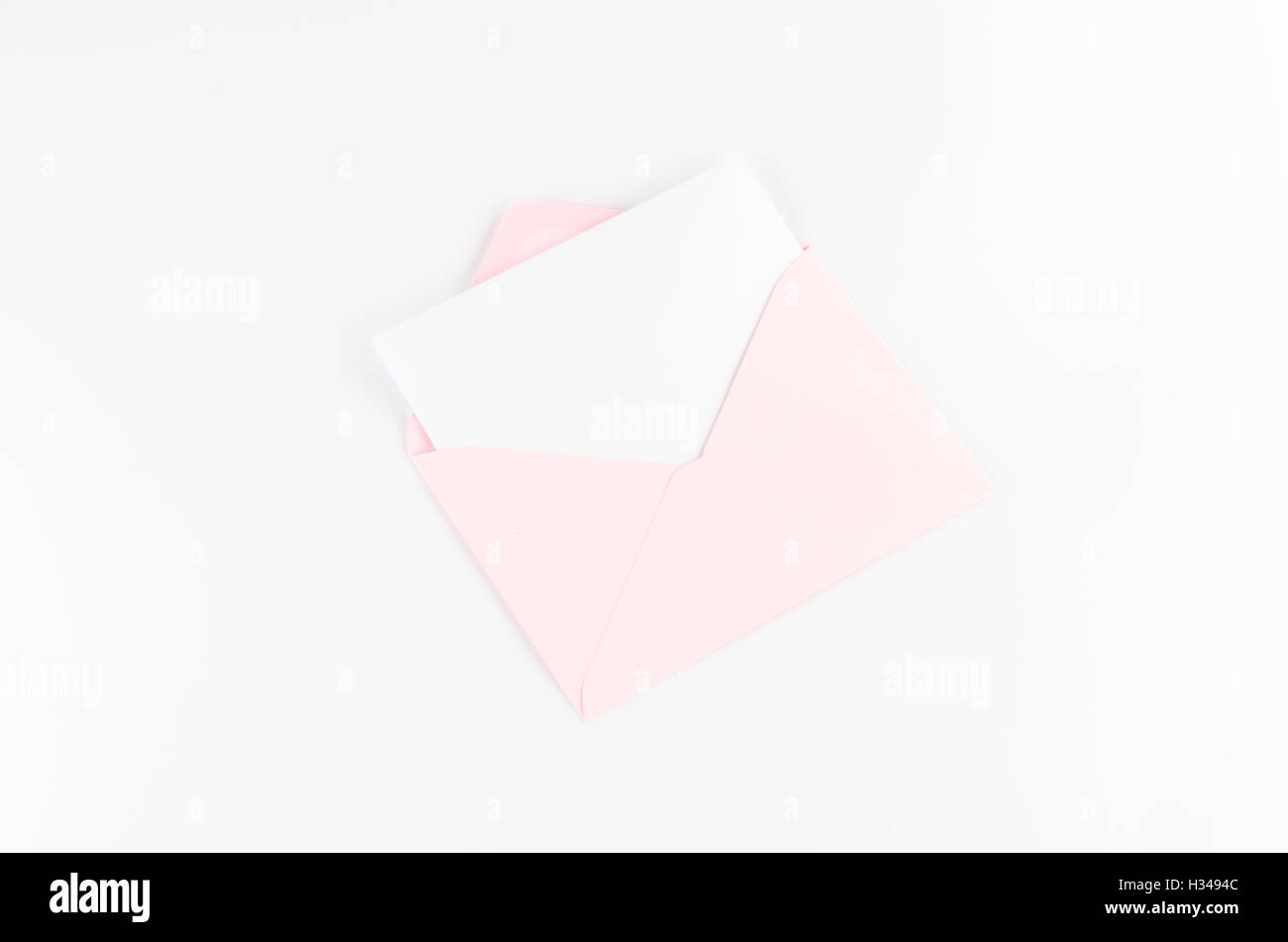 open envelope with white paper Stock Photo - Alamy