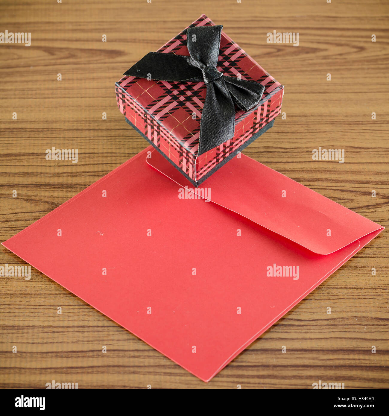 red gift box and envelope Stock Photo - Alamy