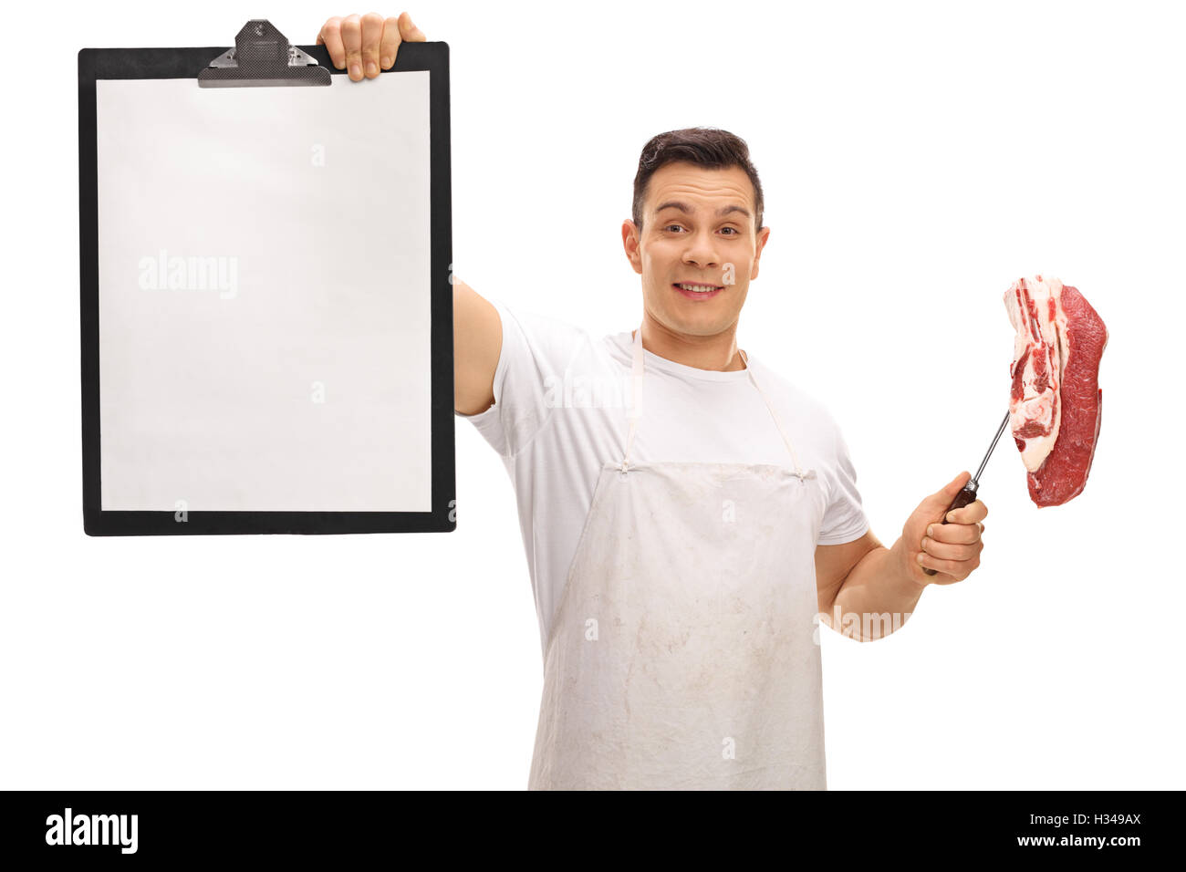 Butcher holding a clipboard and a fork with a steak isolated on white ...