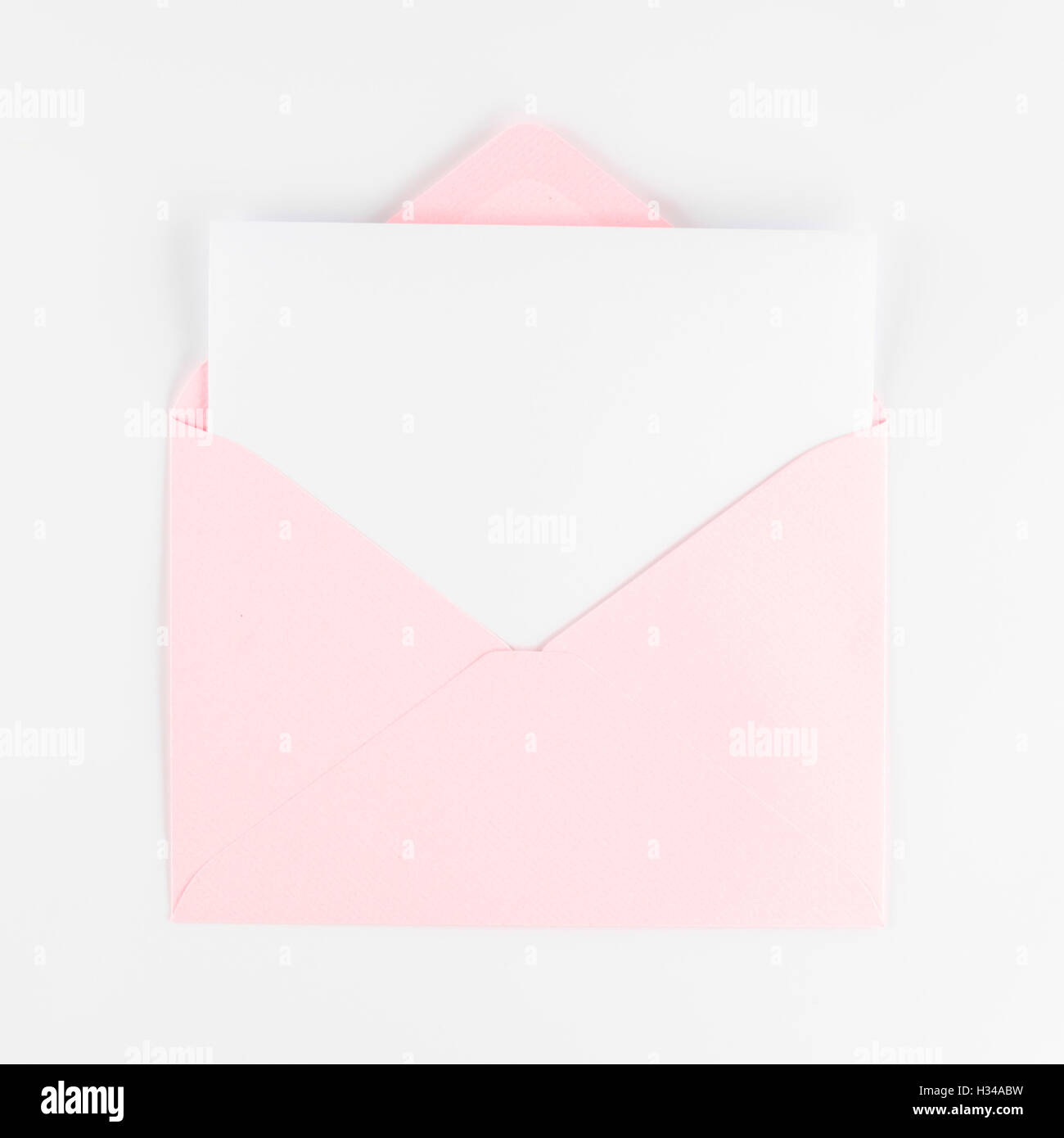 open envelope with white paper Stock Photo - Alamy
