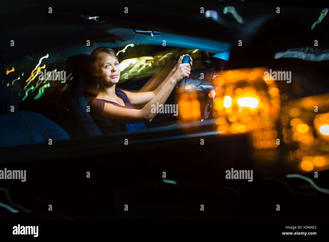 Driving a car at night Stock Photo - Alamy