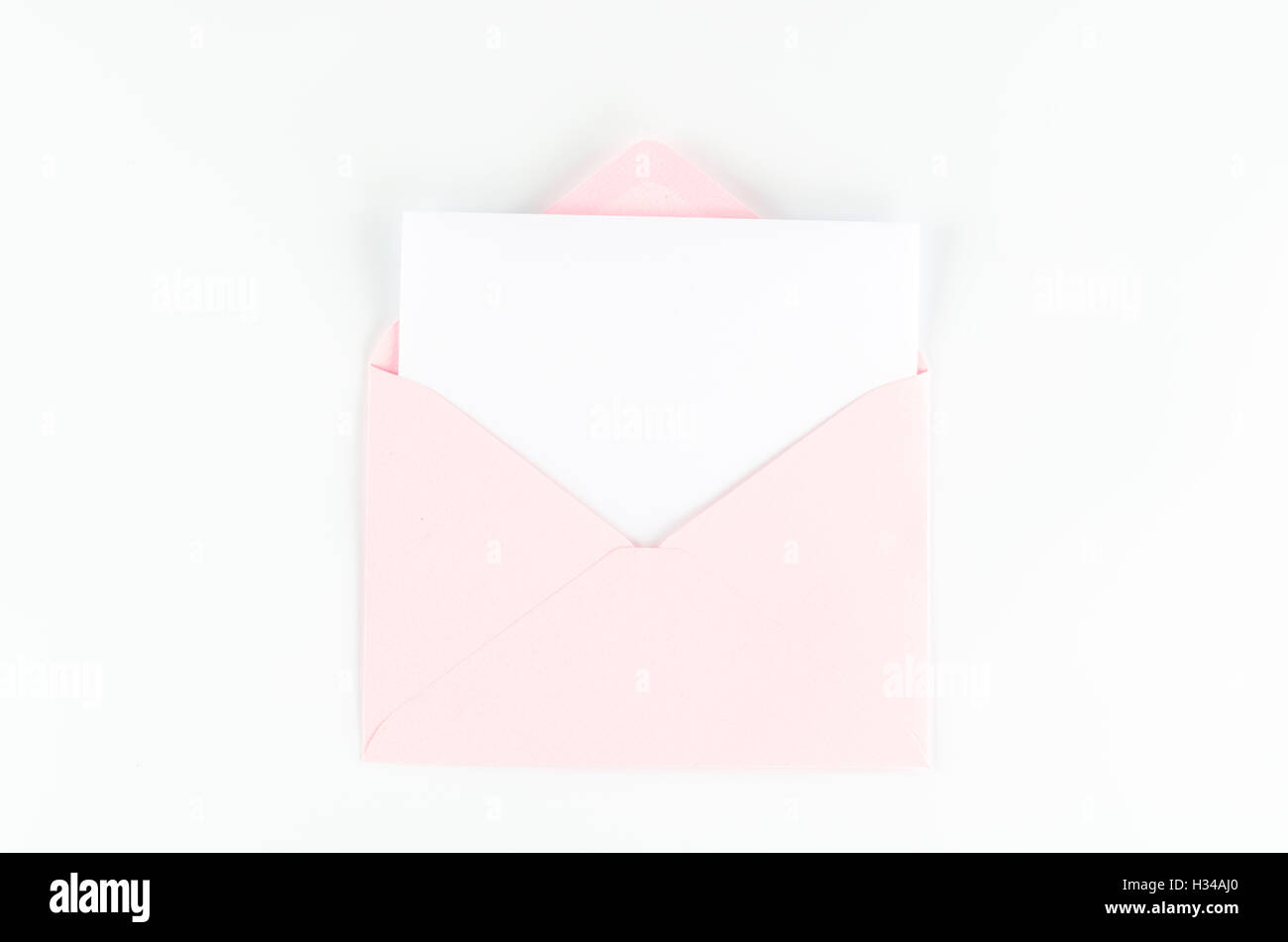 open envelope with white paper Stock Photo - Alamy