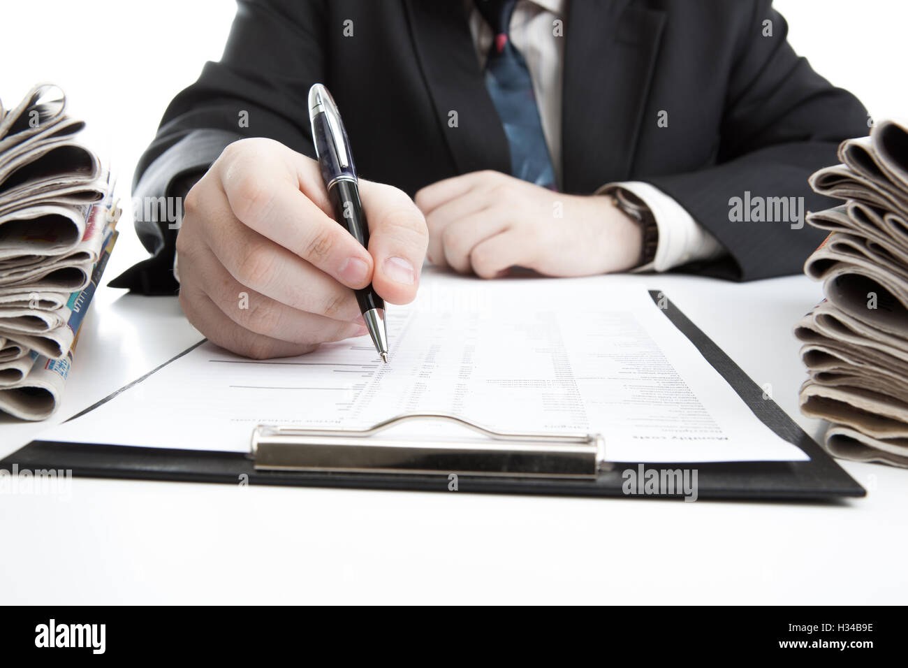 man is looking for information in the in the budget figures Stock Photo ...