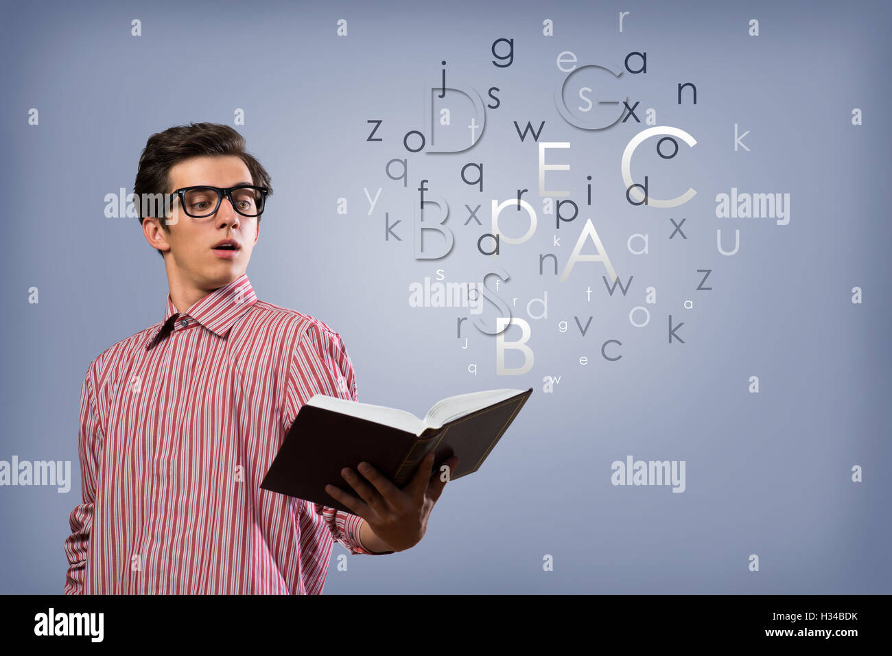 young man scientist with book Stock Photo - Alamy