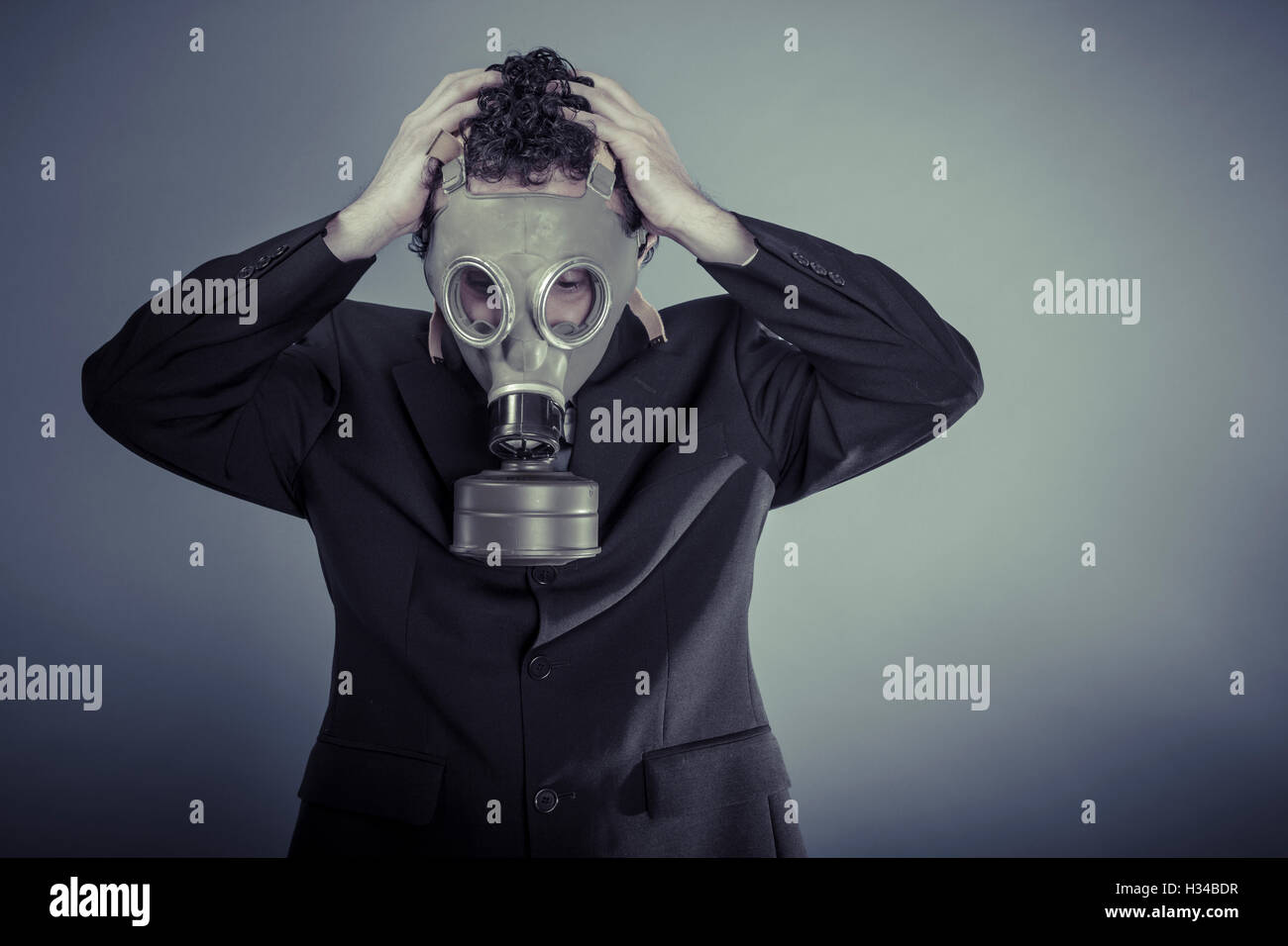 Risk, Business man wearing a gask mask, pollution concept Stock Photo ...