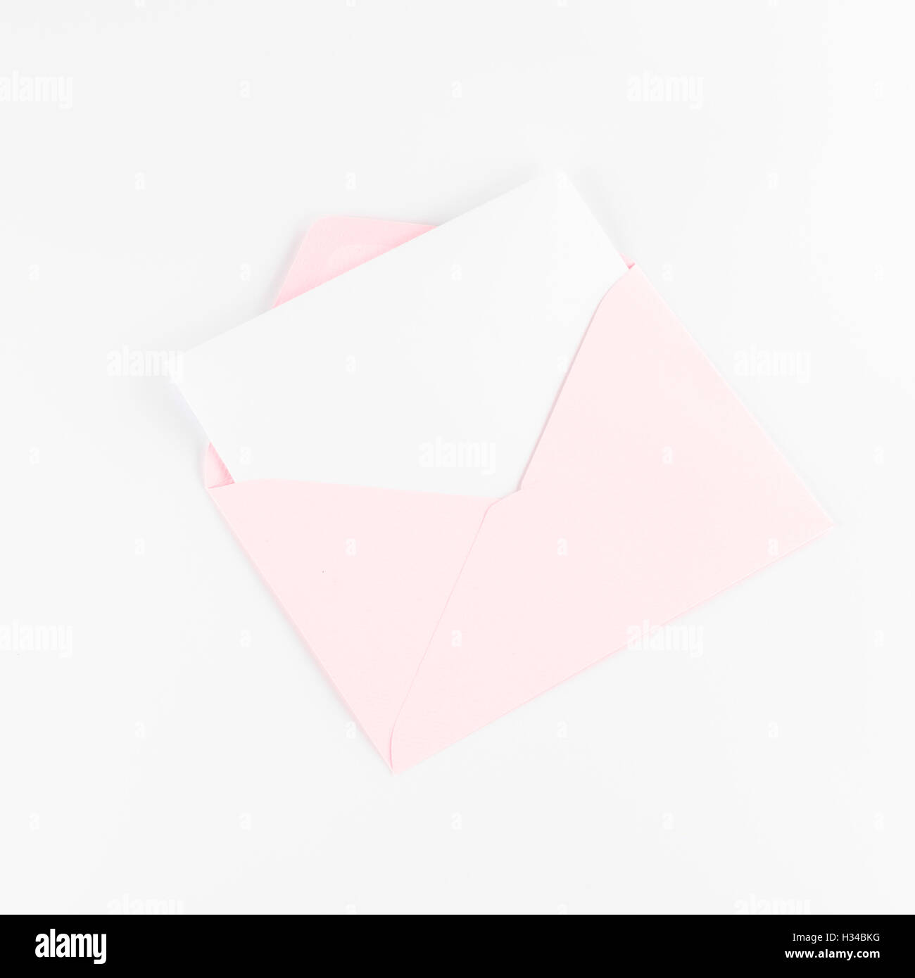 open envelope with white paper Stock Photo - Alamy