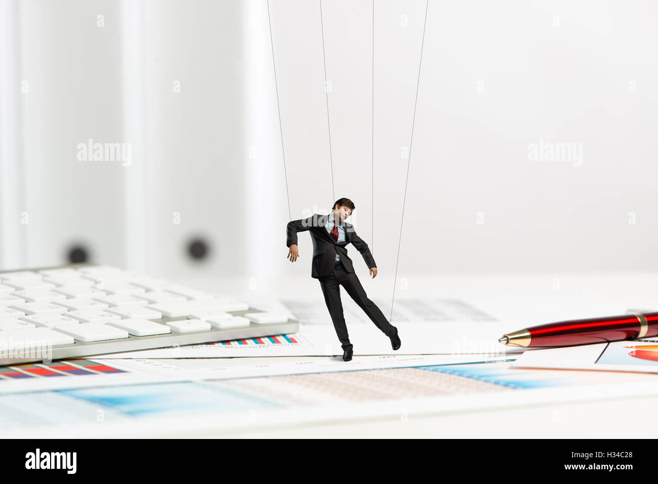 businessman puppet doll is on the desk Stock Photo - Alamy