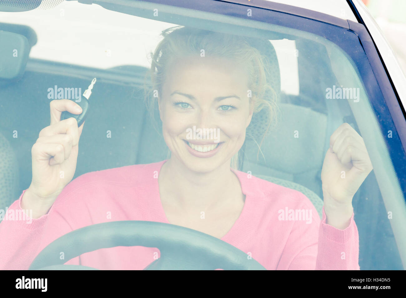 Woman driver showing car keys Stock Photo - Alamy