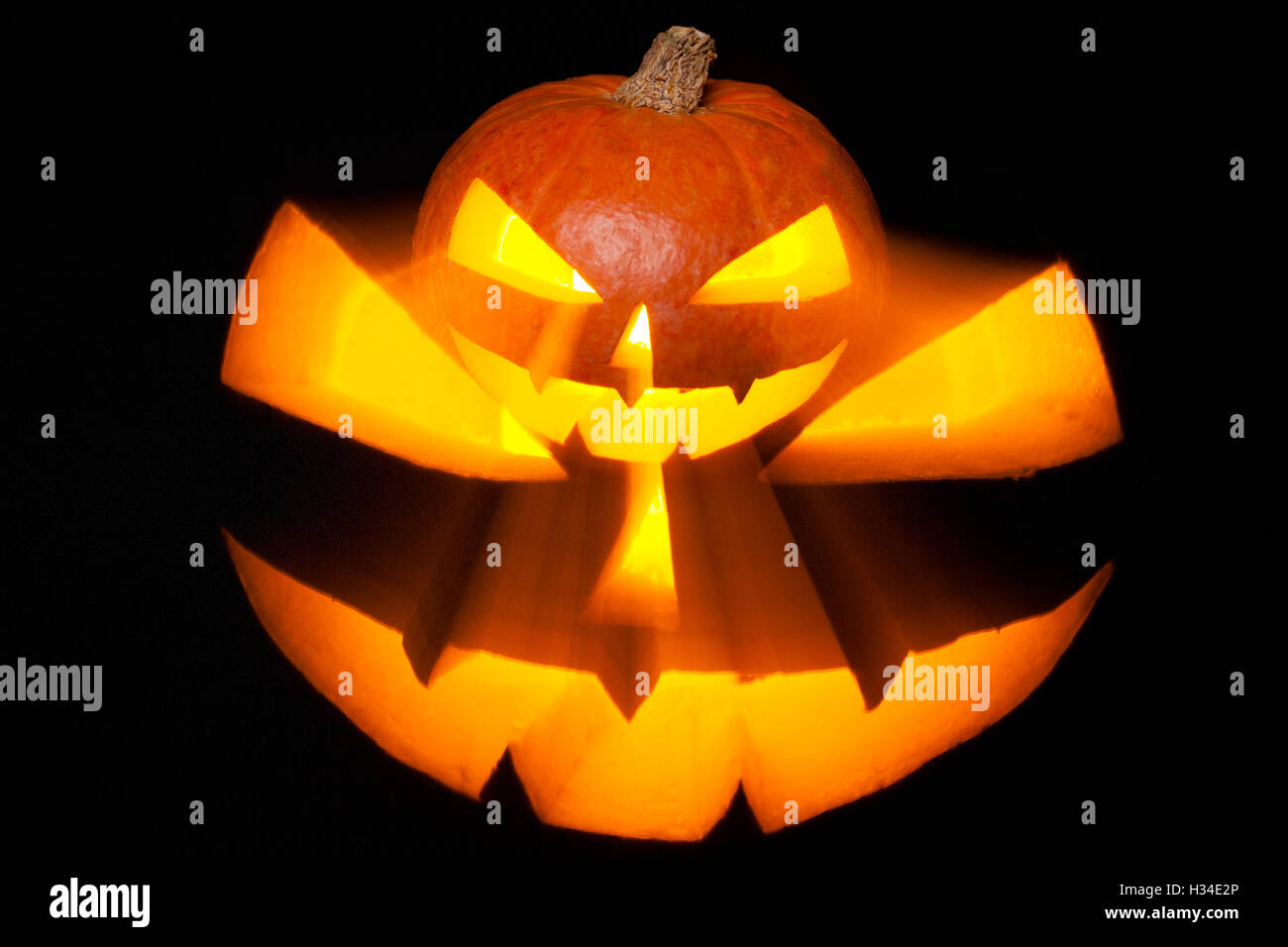 Scary jack o lantern isolated on black Stock Photo - Alamy