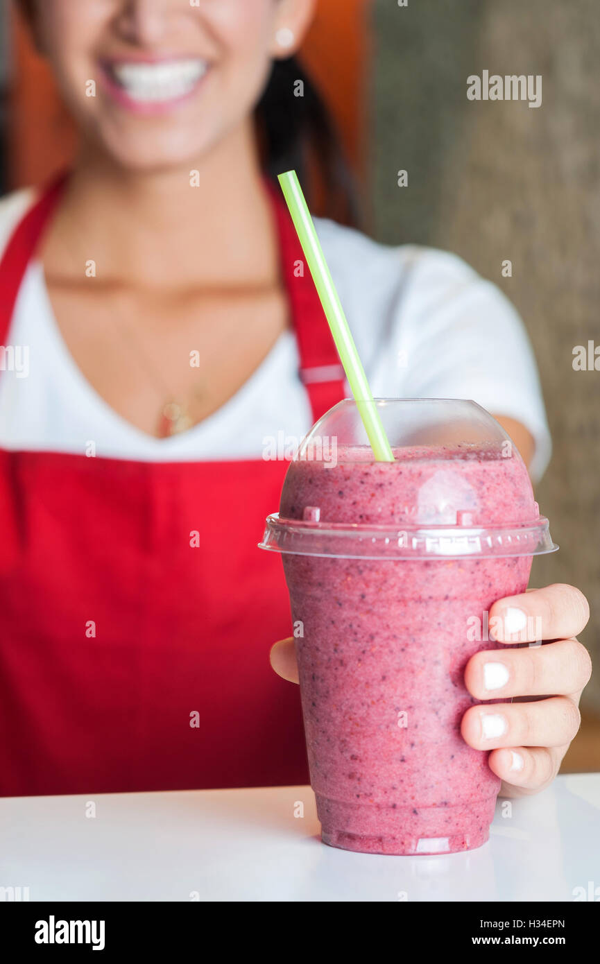 Happy chef serving fresh shake Stock Photo - Alamy