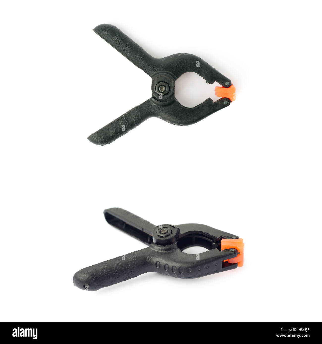 Set of Clamp with orange plastic jaws, isolated over the white ...