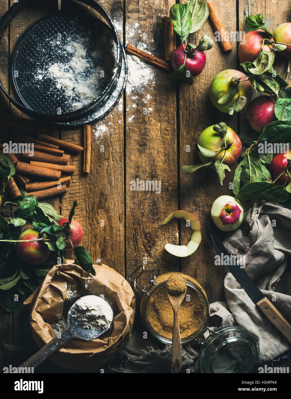 Ingredients for cooking apple pie over rustic wooden background Stock ...