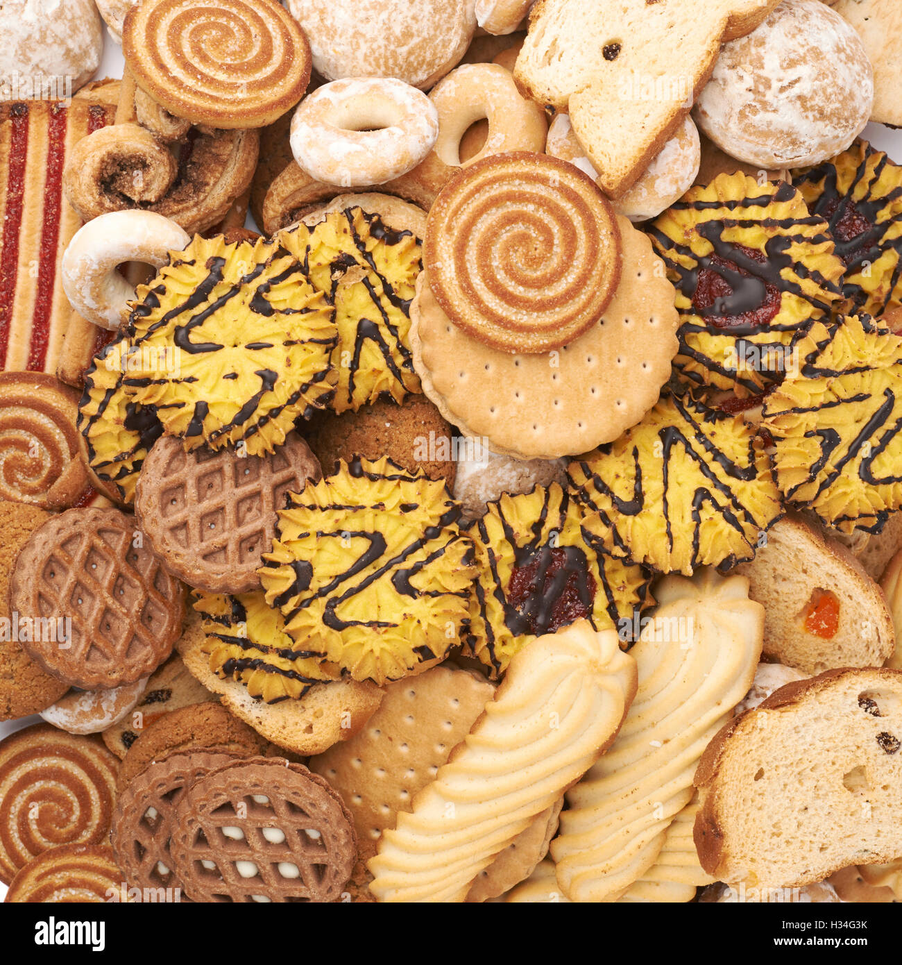 Pile of mix cookies isolated over the white background Stock Photo - Alamy