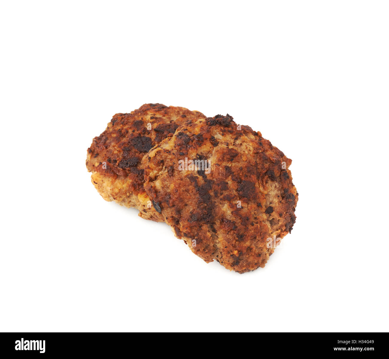 Couple of small hand made cutlets isolated over white background Stock ...