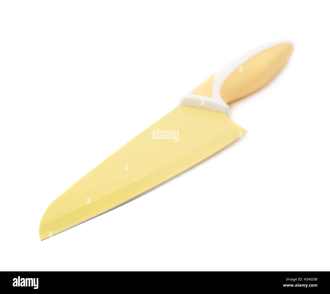 Steel yellow knife isolated over the white background Stock Photo - Alamy