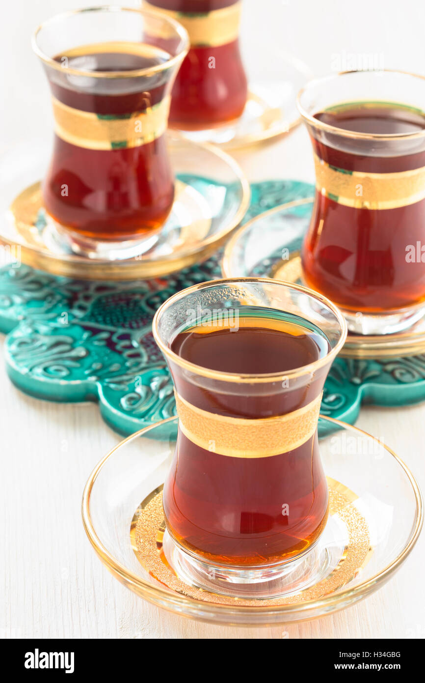 Very taste black Turkish tea drinking, traditional Turkish tea in ...