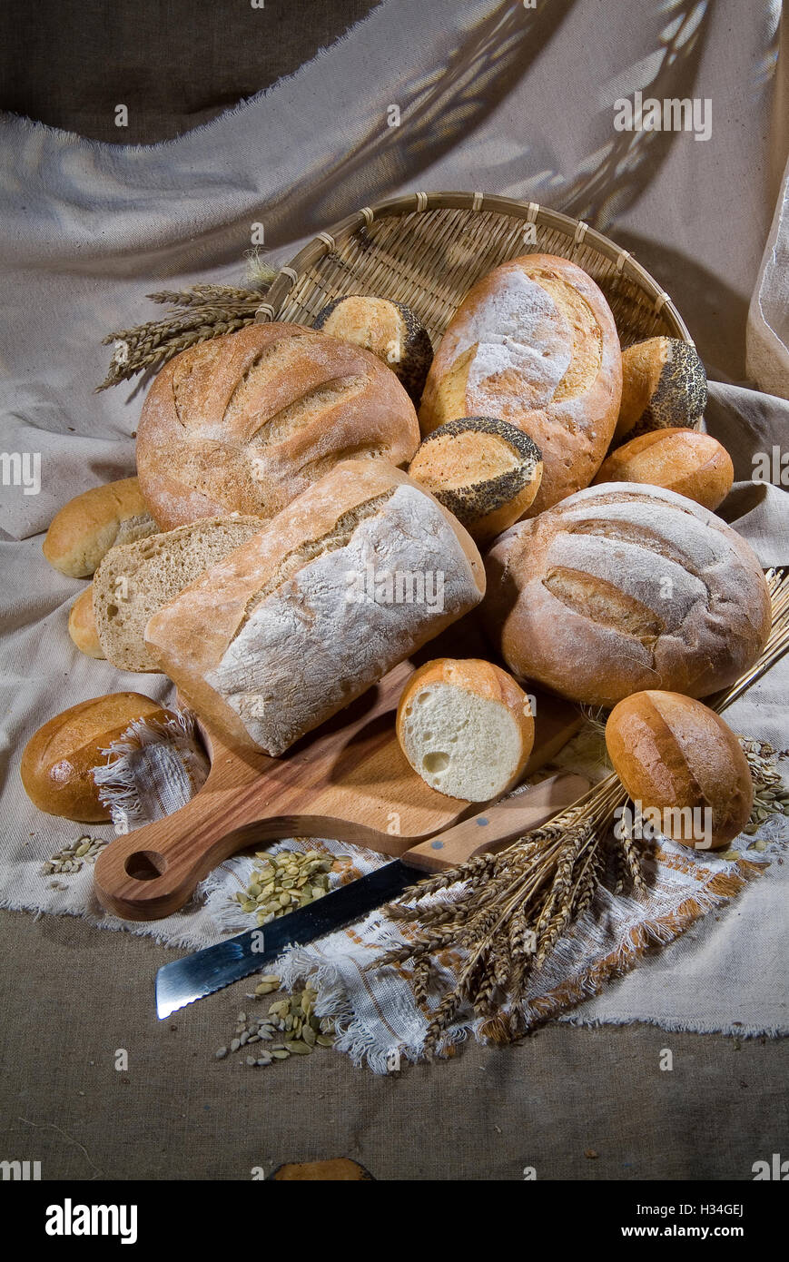 Different kinds of bread and pastry on a canvas studio background Stock ...