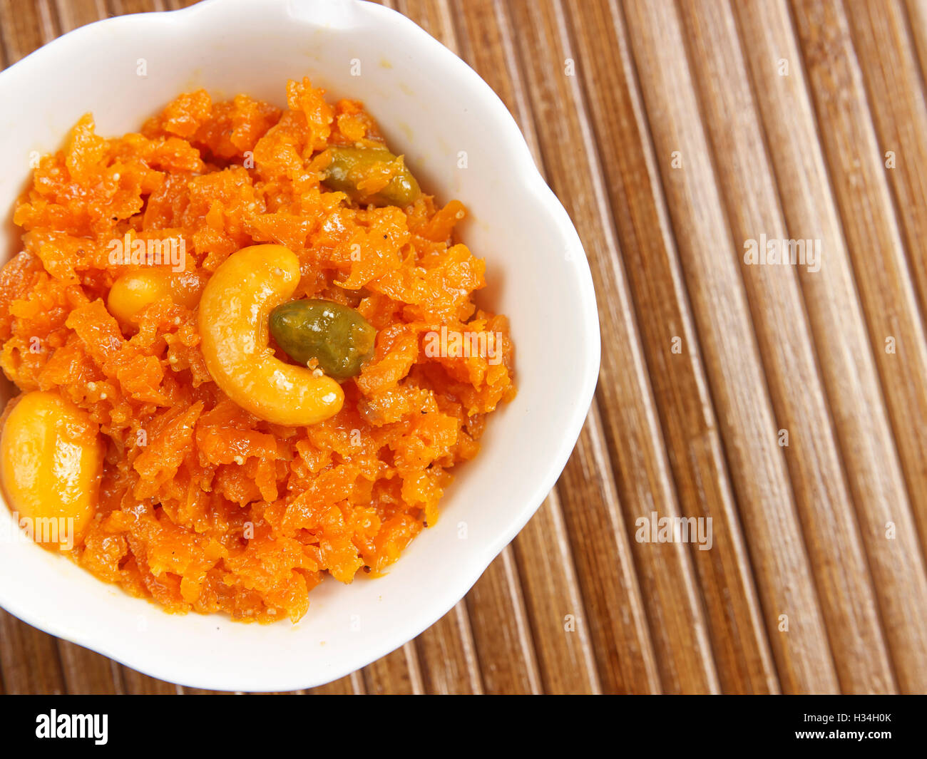 Carrot halwa with dry fruits a traditional Sindhi food served in a bowl ...