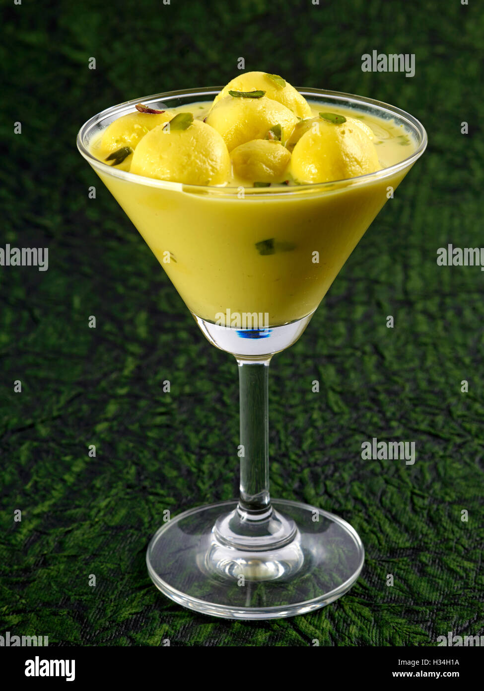 Malai gulla in milk syrup a north Indian sweet dish Stock Photo - Alamy