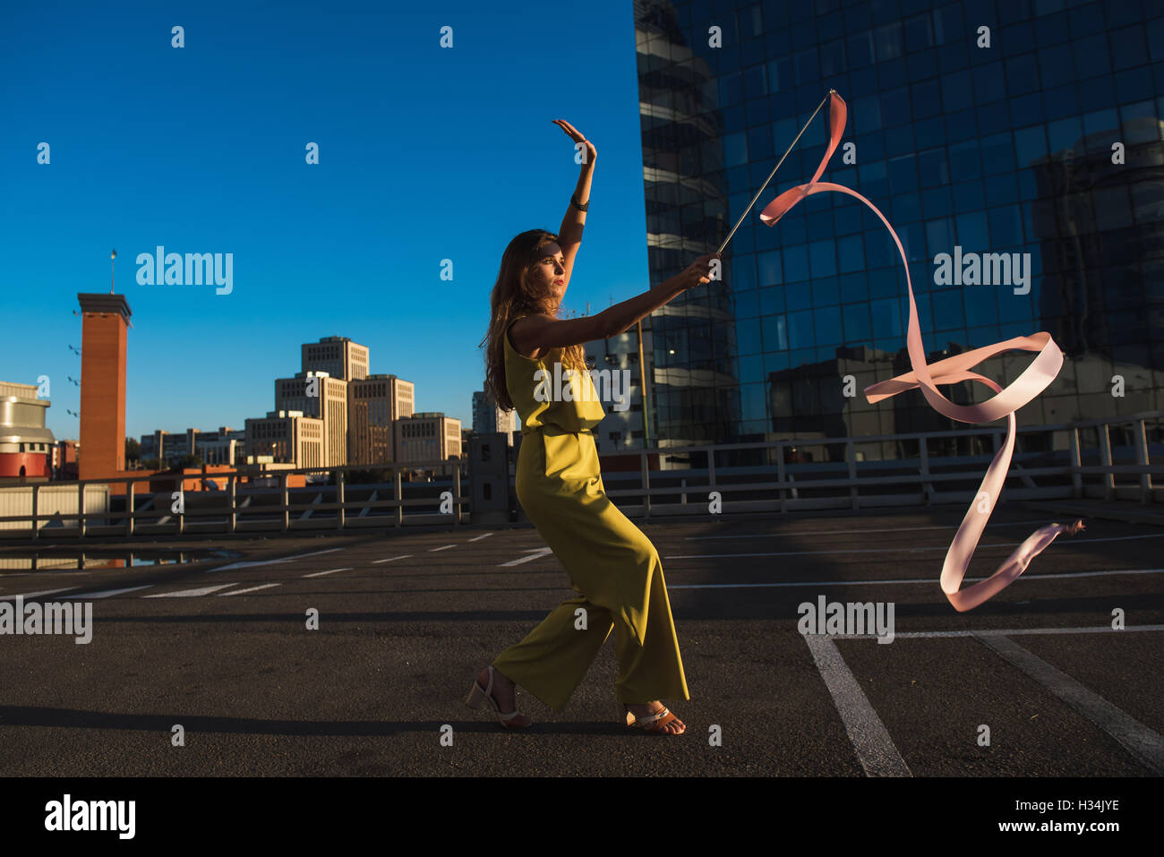 Gymnast girl with ribbon Stock Photo - Alamy
