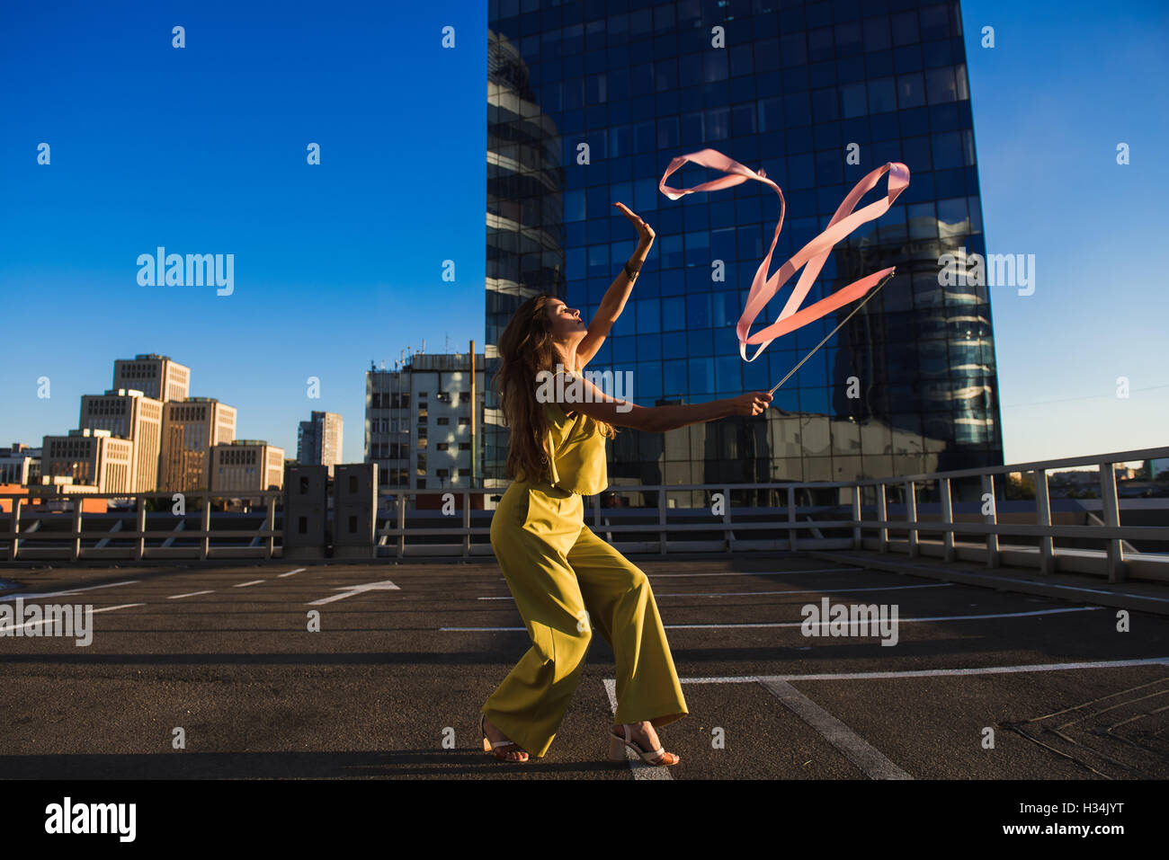 Gymnast girl with ribbon Stock Photo - Alamy