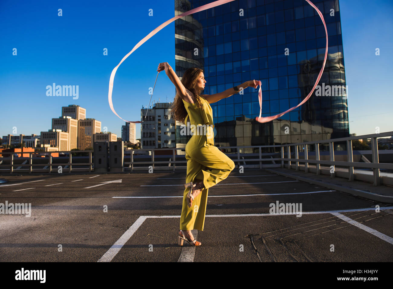 Gymnast girl with ribbon Stock Photo - Alamy