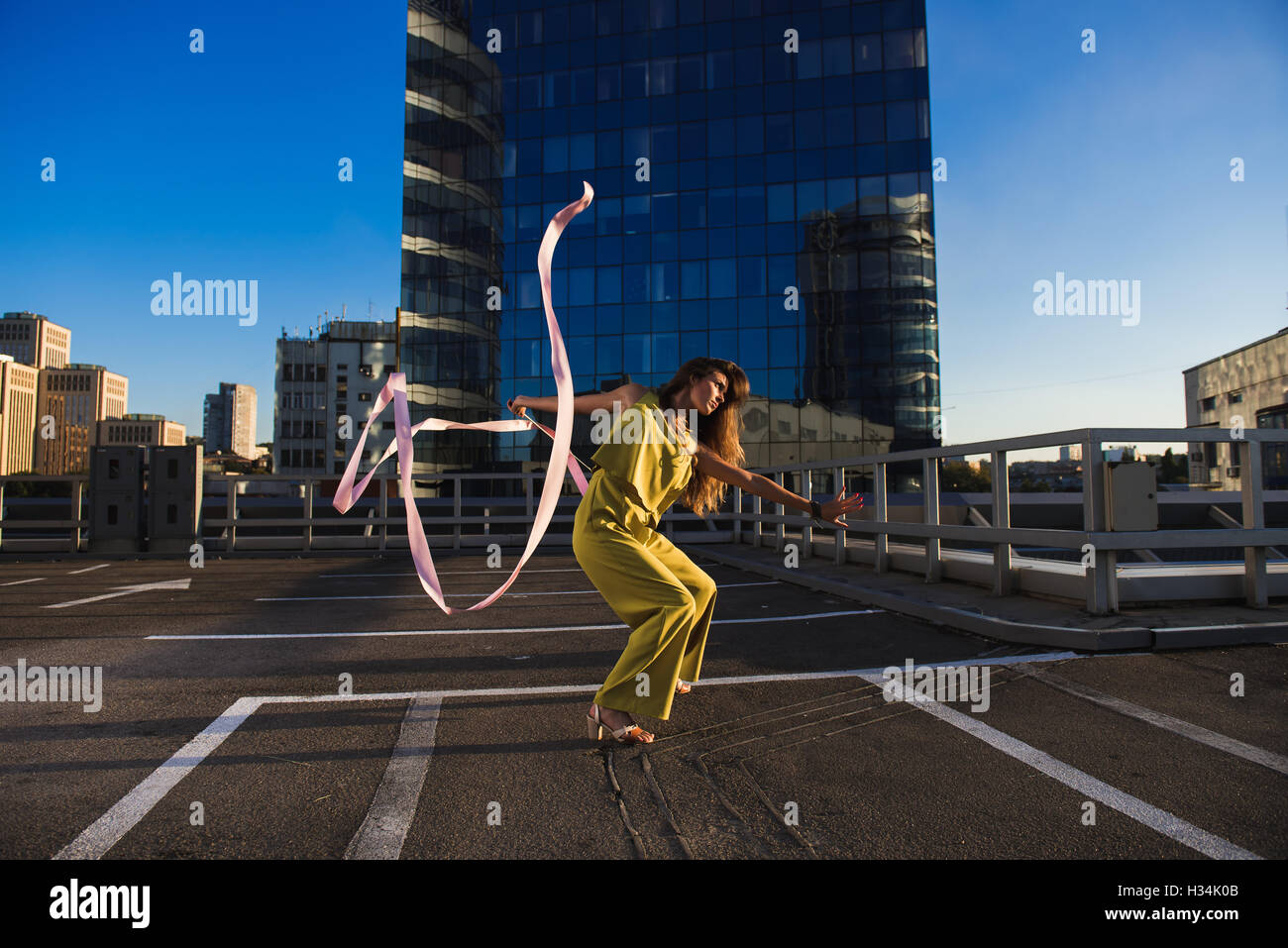 Gymnast girl with ribbon Stock Photo - Alamy