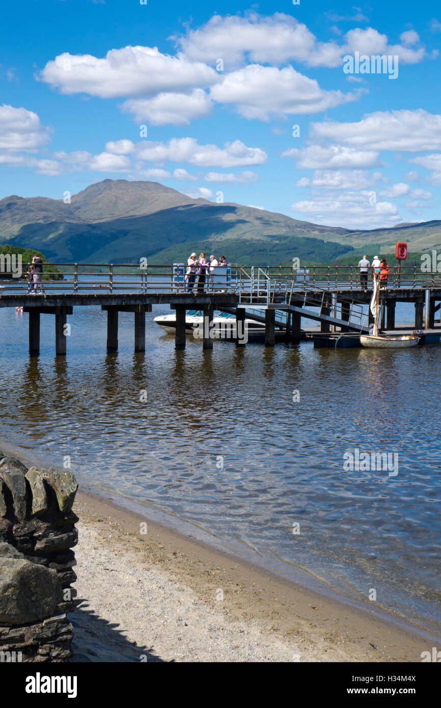 jetty at Luss Loch Lomond with Ben Lomond in the background Stock Photo ...