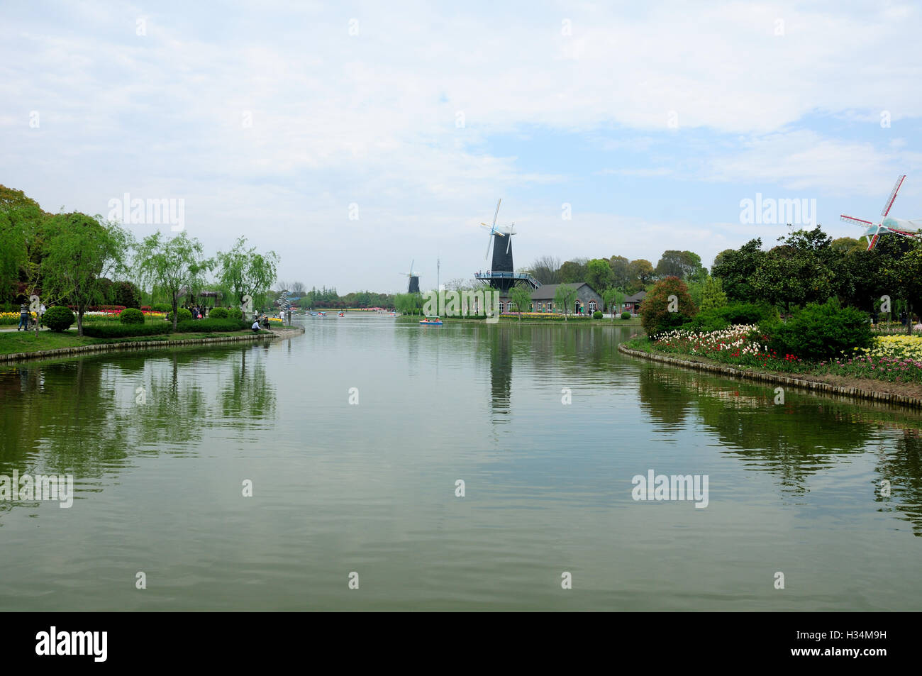 A small manmade lake at the shanghai flower port surrounded by ...
