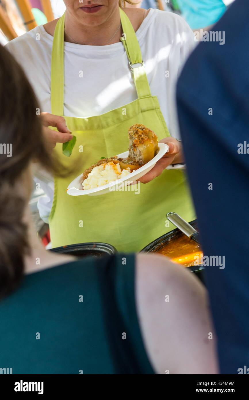 Chef selling delicious food Stock Photo - Alamy