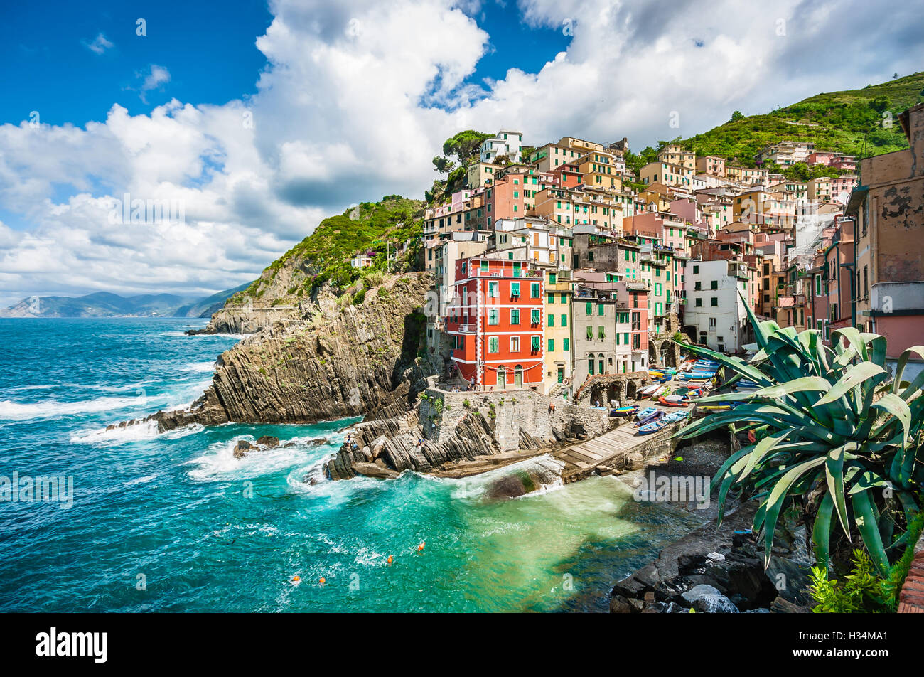 Classic view of Riomaggiore, one of the five famous fisherman villages of Cinque Terre in ...