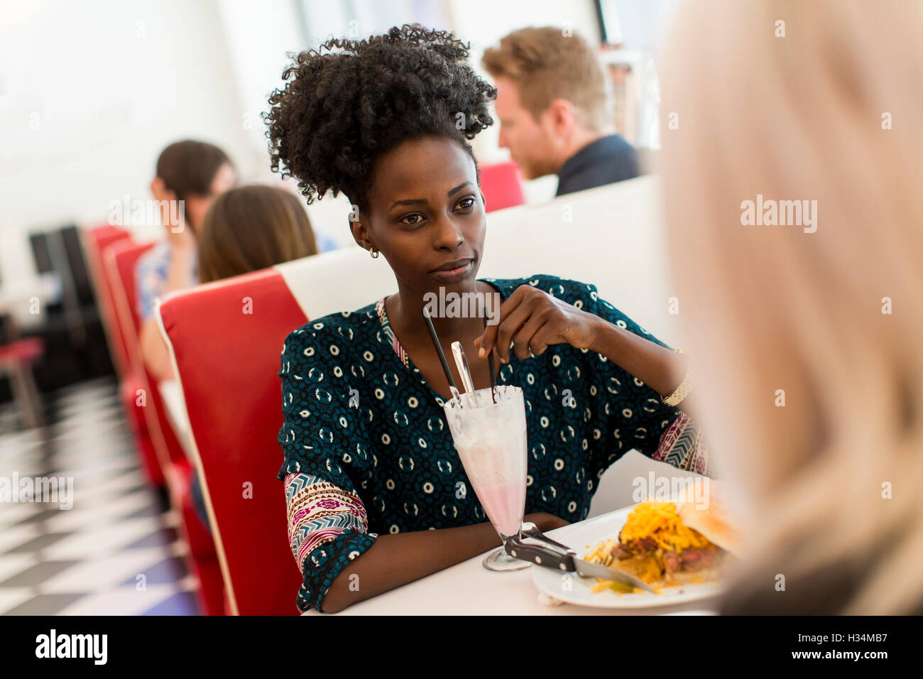 View of the people meeting in the diner Stock Photo - Alamy