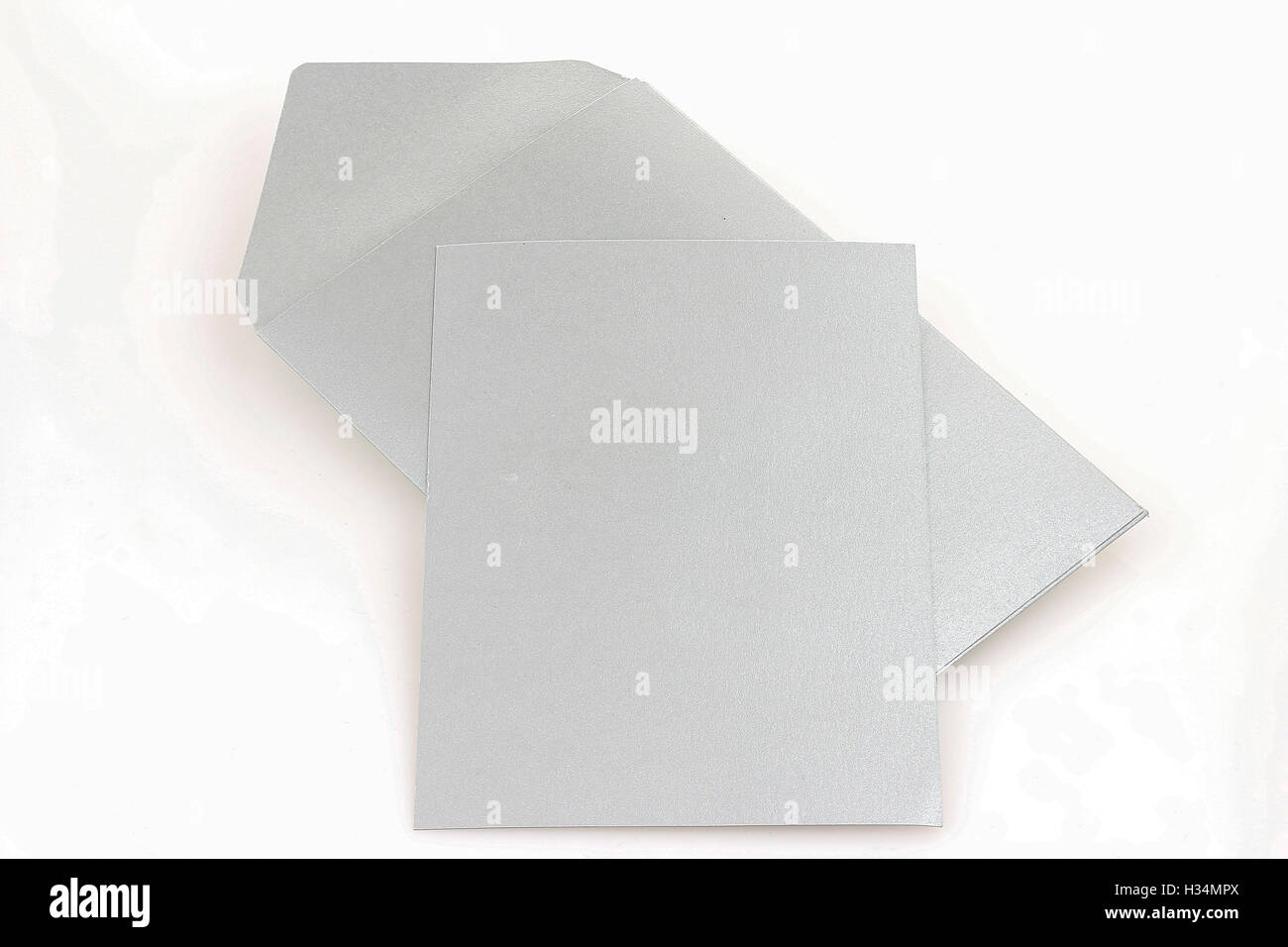 Grey envelope with blank grey card isolated on white background Stock ...