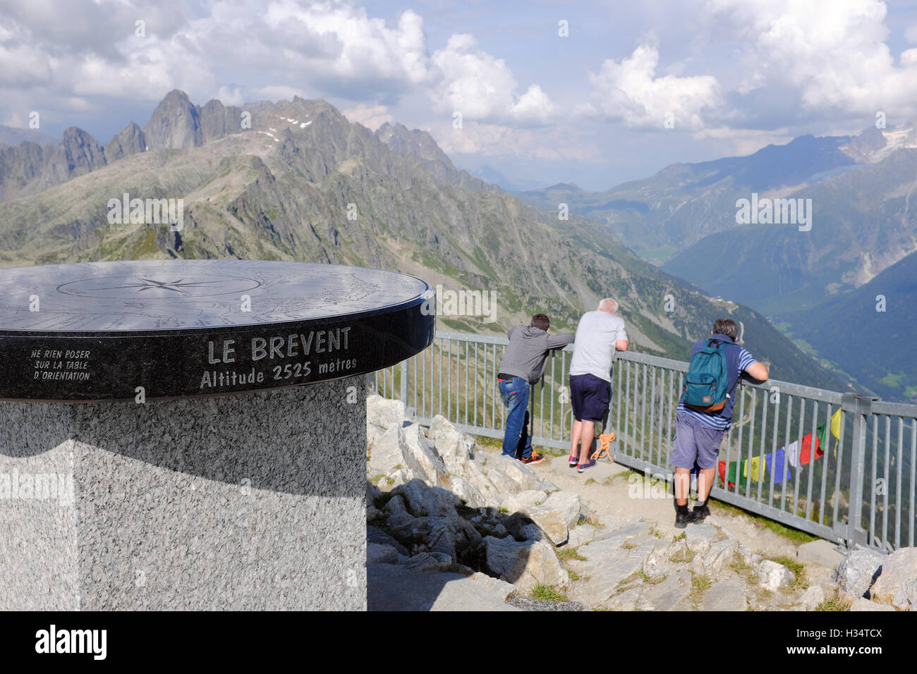 A group of tourists admire from the view from Le Brévent mountain near ...