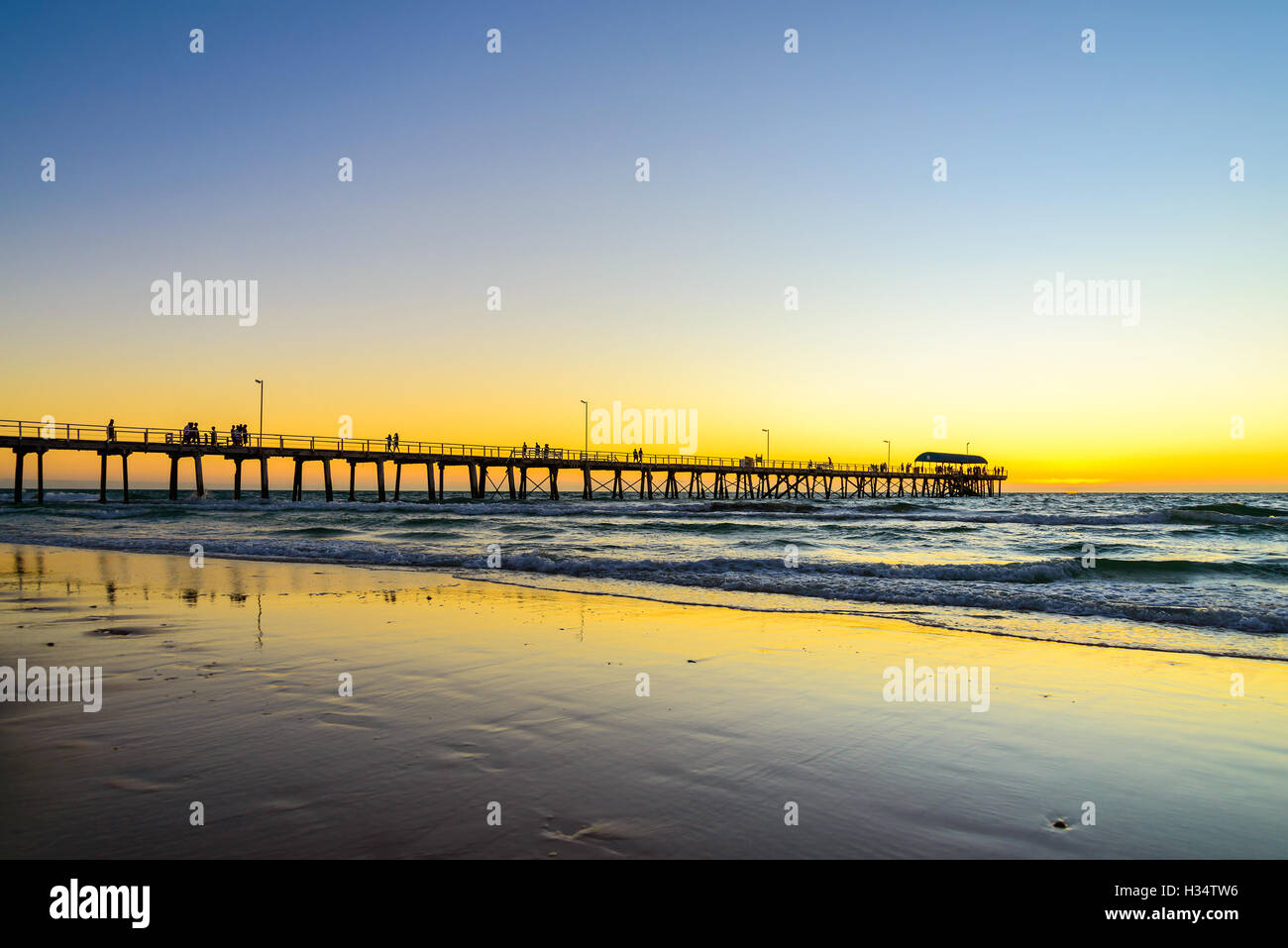 Henley Beach Jetty with people on a warm sunny evening Stock Photo - Alamy