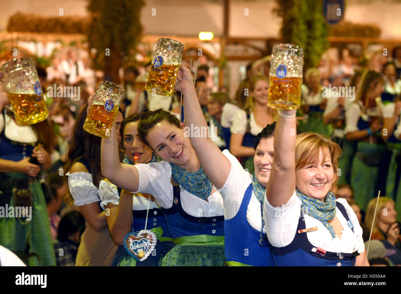 Servers celebrating in the Hofbraeu tent during the finale of the 183rd ...