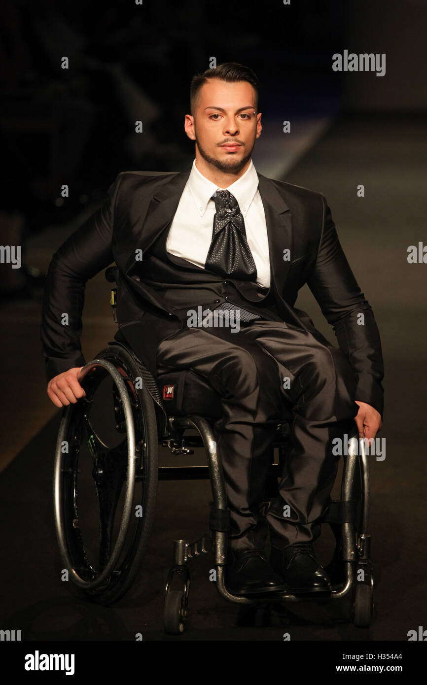 Milan, Italy. 3rd Oct, 2016. Models and disabled models in wheelchair ...