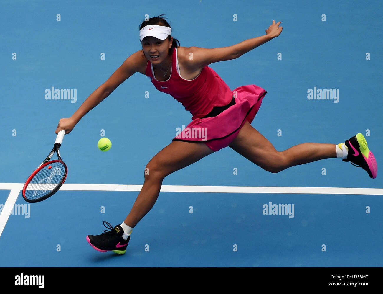 Beijing, China. 5th Oct, 2016. Peng Shuai of China hits a return to Caroline Garcia of France ...