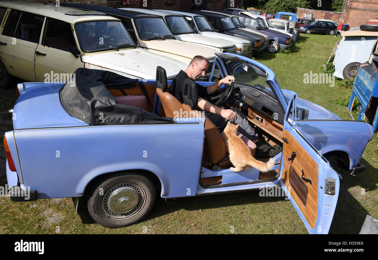 Trabant collector Hanjo Aleit sits in his 'summer car' - a blue Trabant ...
