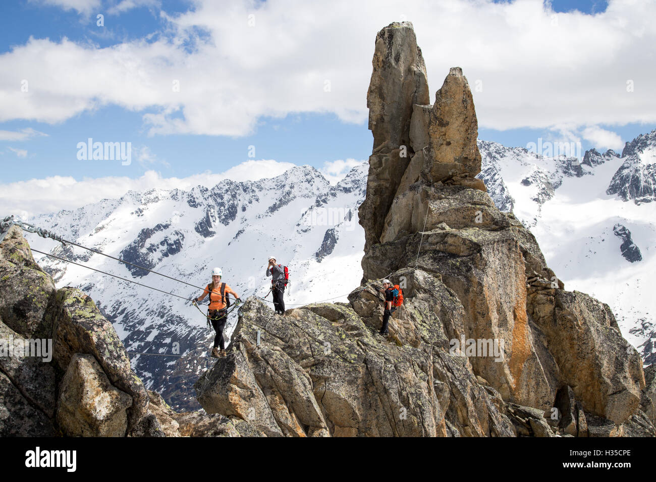 Group of climbers on Via Ferrata in Switzerland Stock Photo - Alamy