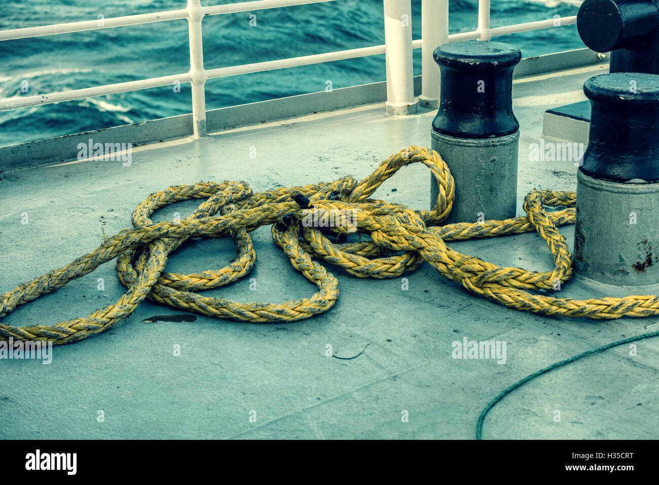 rope on a deck of ship in the sea Stock Photo - Alamy