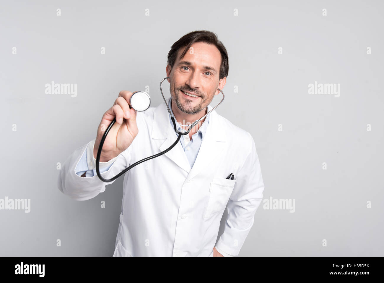 Handsome doctor hi-res stock photography and images - Alamy