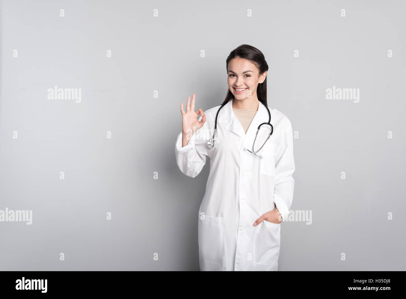 Joyful delighted female doctor expressing joy Stock Photo - Alamy