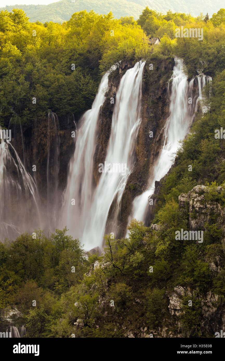 Heavy flow of water into the canyon at a large waterfall after heavy ...