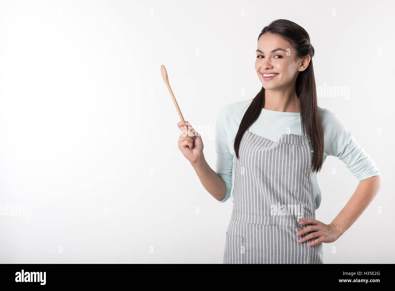 Woman with spoon hi-res stock photography and images - Alamy