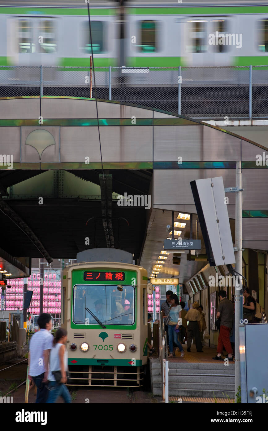 A twilight view shows the Toden Arakawa Line (the last remnant of the ...