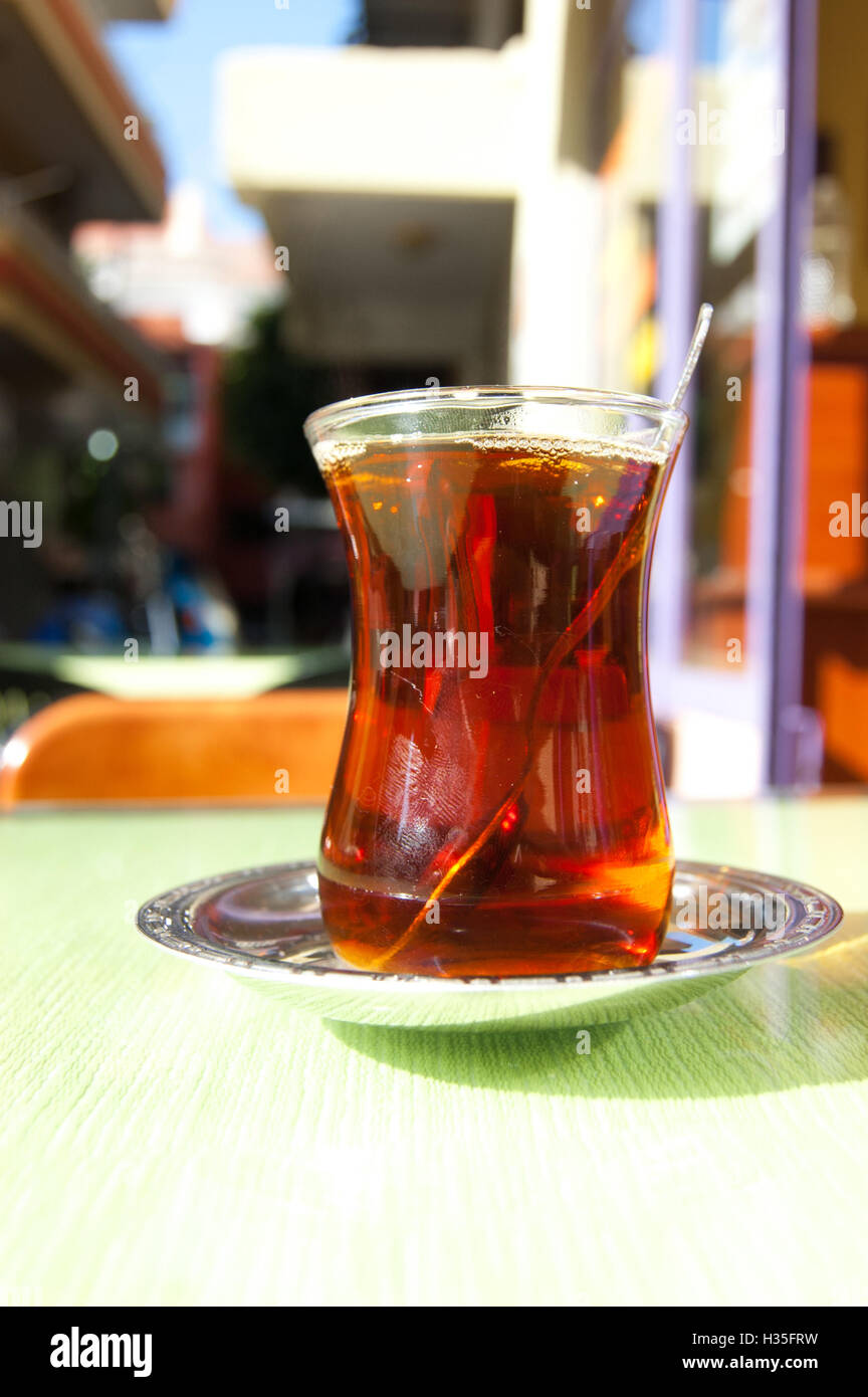 Glass cup of Turkish tea in traditional shapes. Tea in Turkey Stock ...