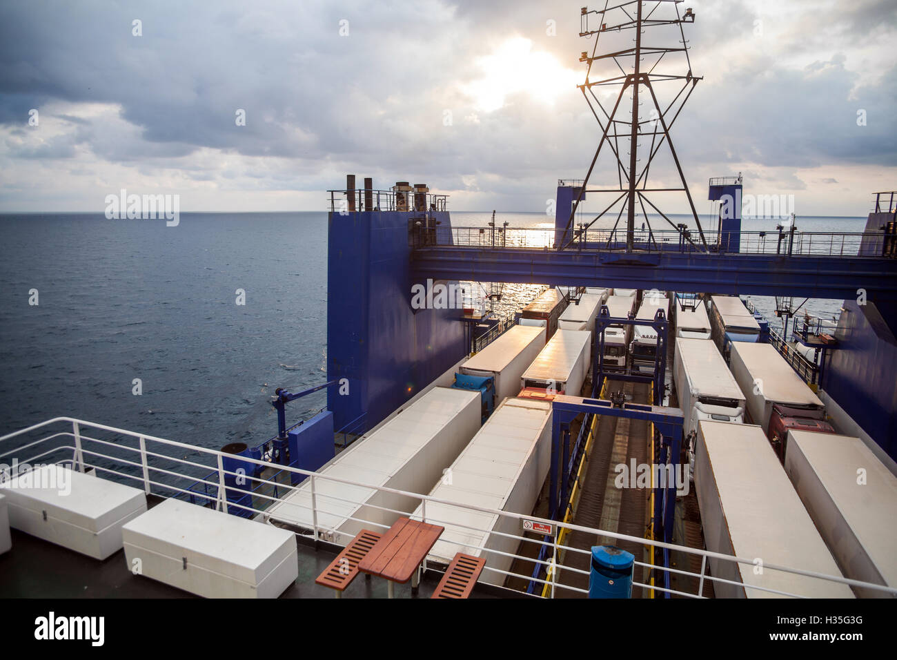 Color image of some trucks loaded on the deck of a ferry boat Stock ...